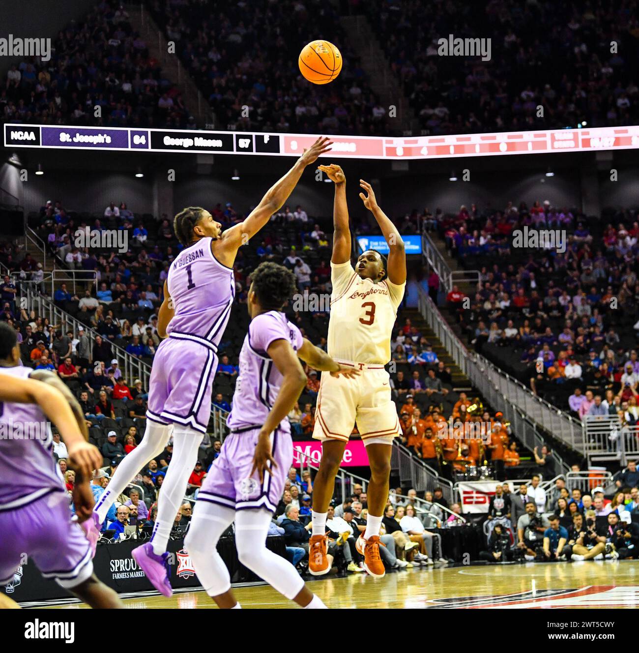 Kansas City, Missouri, USA. 13th Mar, 2024. Texas (3) Max Abmas shooting three pointer over KSU ...