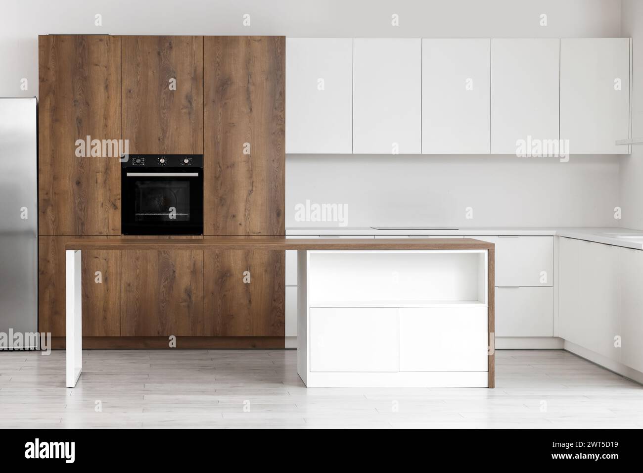 Interior of empty kitchen with table and counters Stock Photo - Alamy