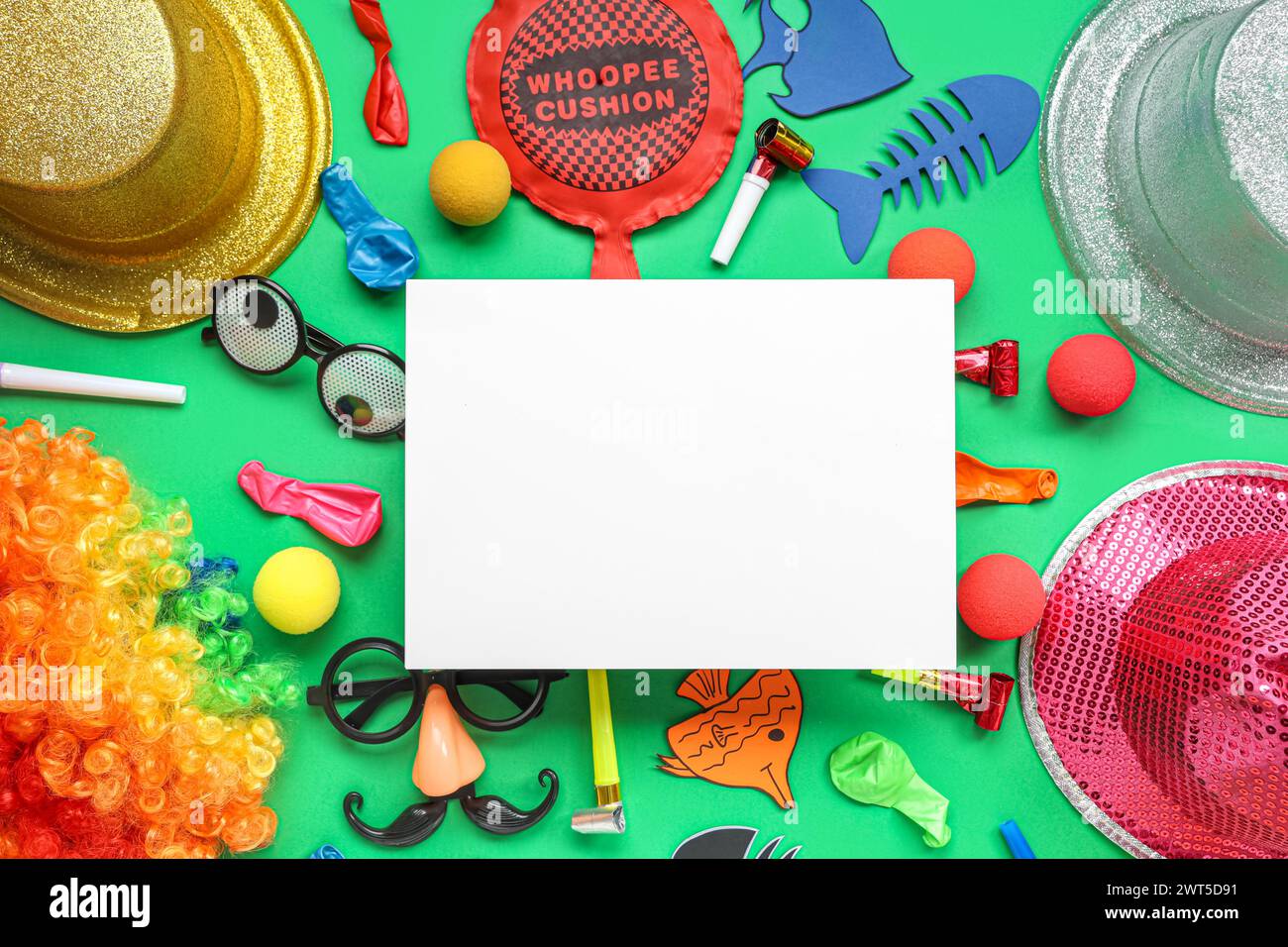 Blank card with hats, funny glasses and party decor on green background ...