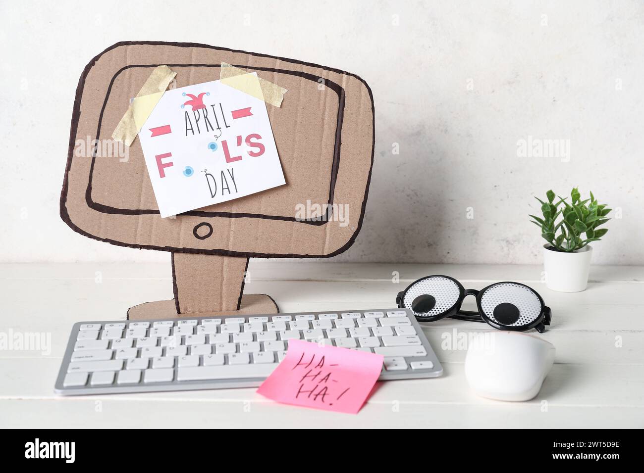 Carton computer screen, keyboard and sticky notes on white background ...