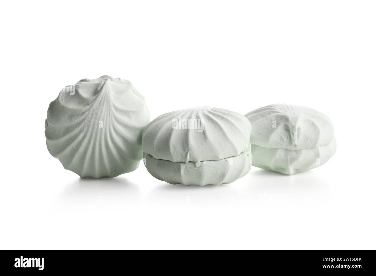 Sweet zefirs on white background Stock Photo - Alamy