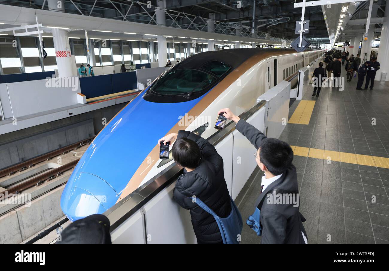 The Hokuriku Shinkansen departs from Tsuruga Station in Tsuruga City, Fukui Prefecture on March ...