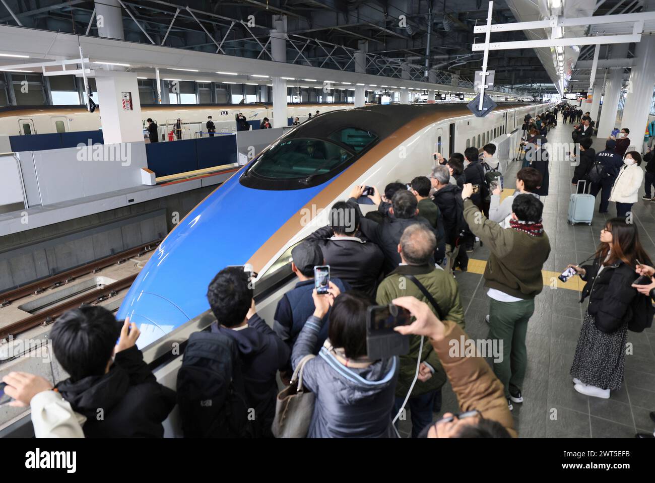 The Hokuriku Shinkansen departs from Tsuruga Station in Tsuruga City ...