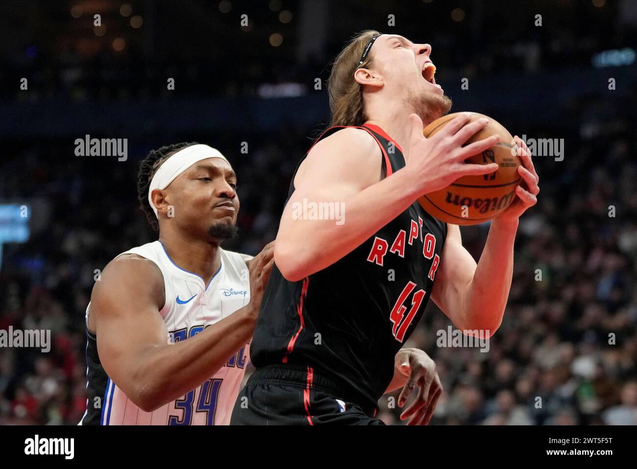 Orlando Magic center Wendell Carter Jr. (34) fouls Toronto Raptors ...