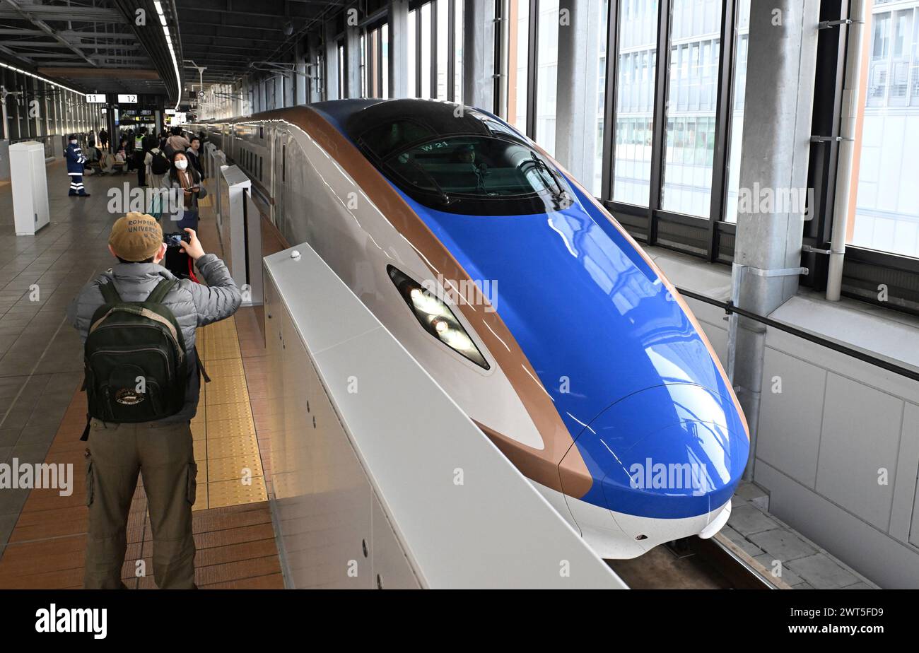 The Hokuriku Shinkansen arrives at Tsuruga Station in Tsuruga City ...