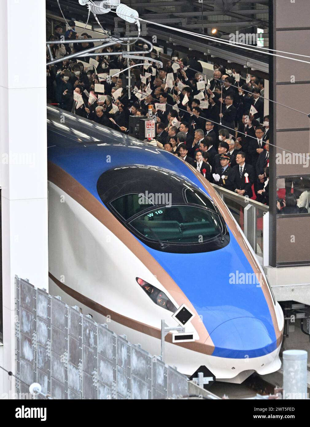 The Hokuriku Shinkansen arrives at Tsuruga Station in Tsuruga City ...
