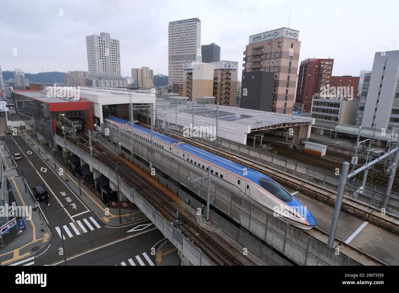 The Hokuriku Shinkansen arrives at Tsuruga Station in Tsuruga City ...