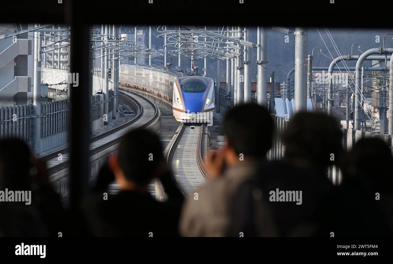 The Hokuriku Shinkansen arrives at Tsuruga Station in Tsuruga City ...