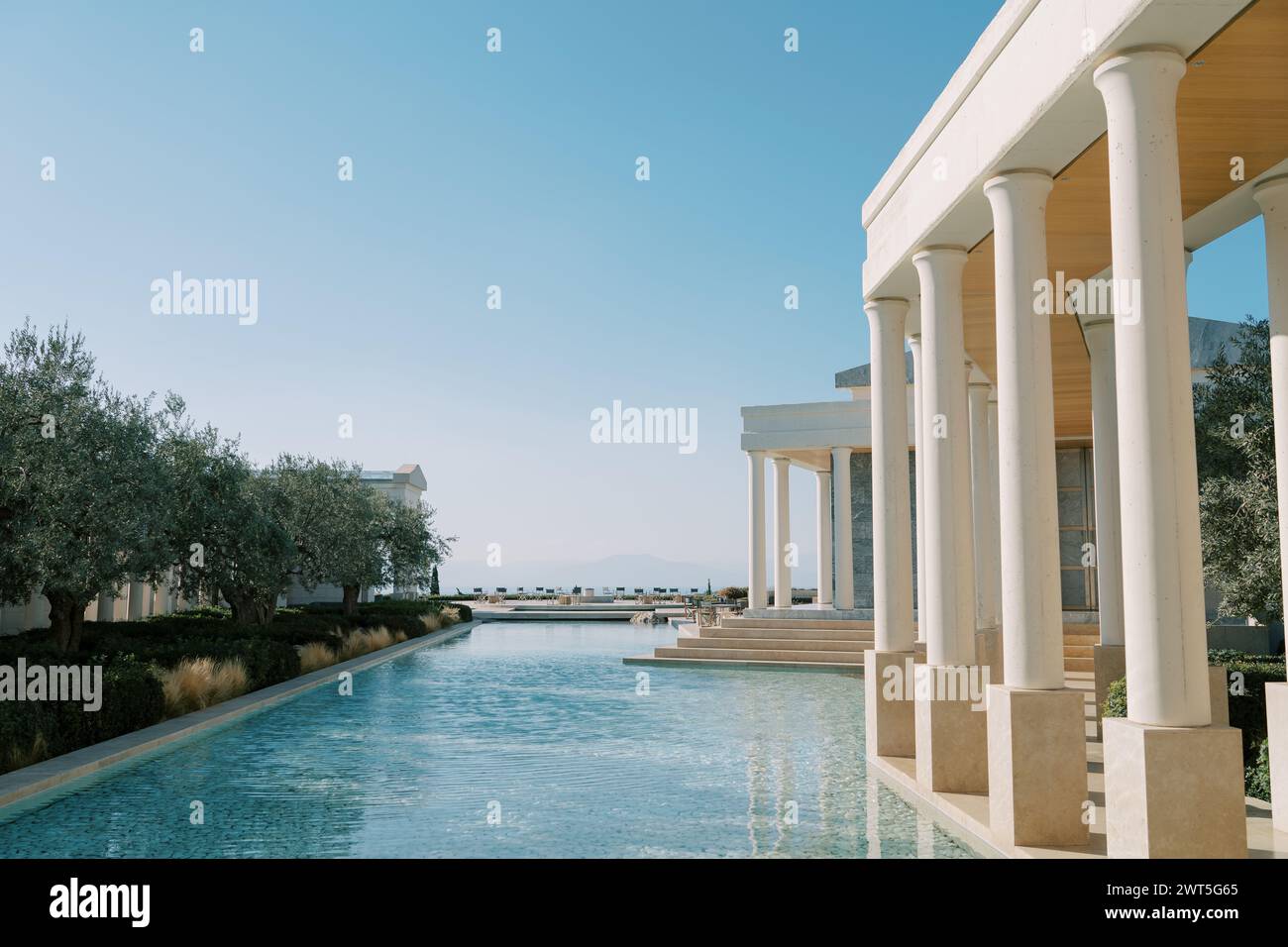 Long passage with columns by the pool. Hotel Amanzoe. Peloponnese ...