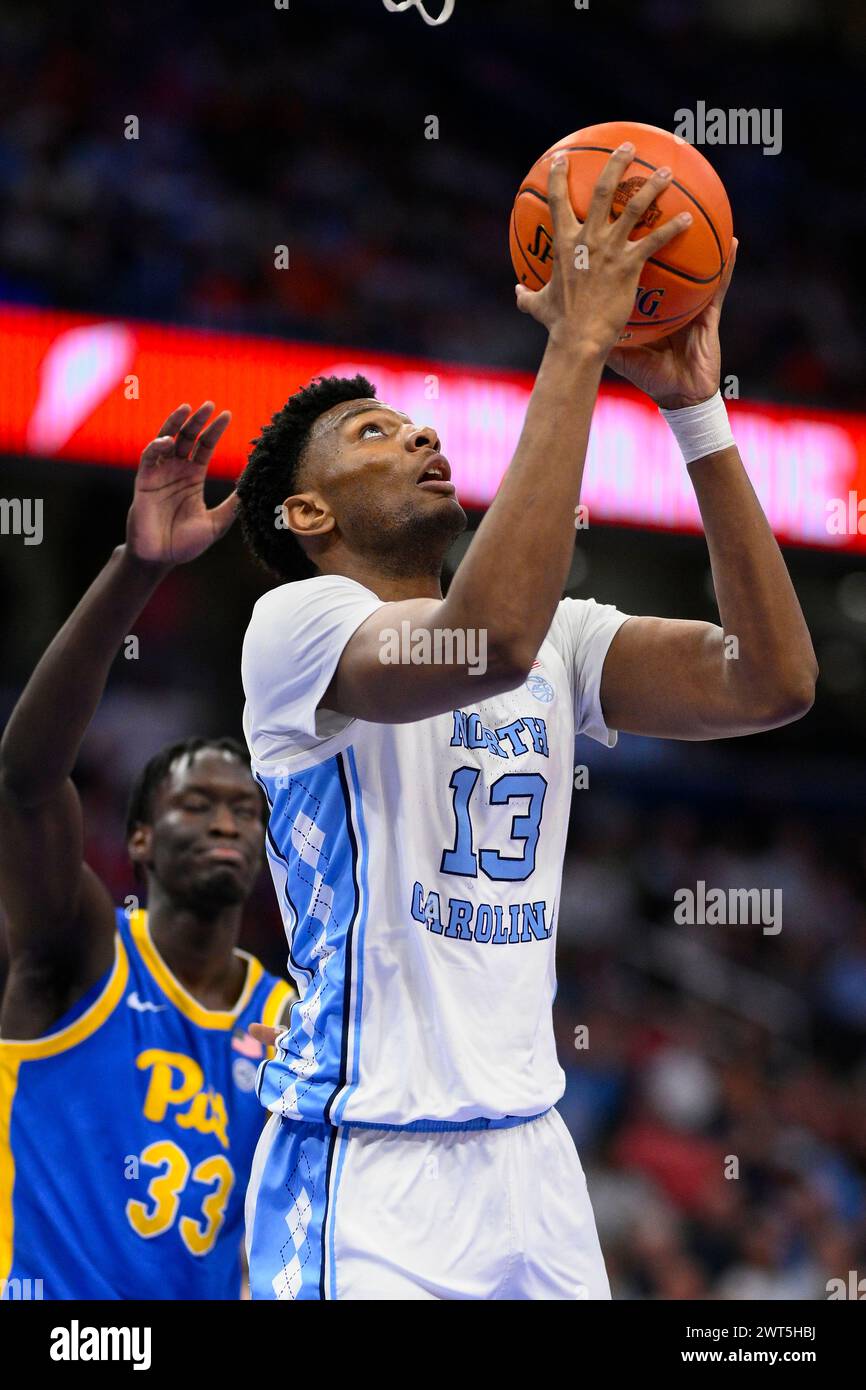 North Carolina forward Jalen Washington (13) shooting under the basket ...