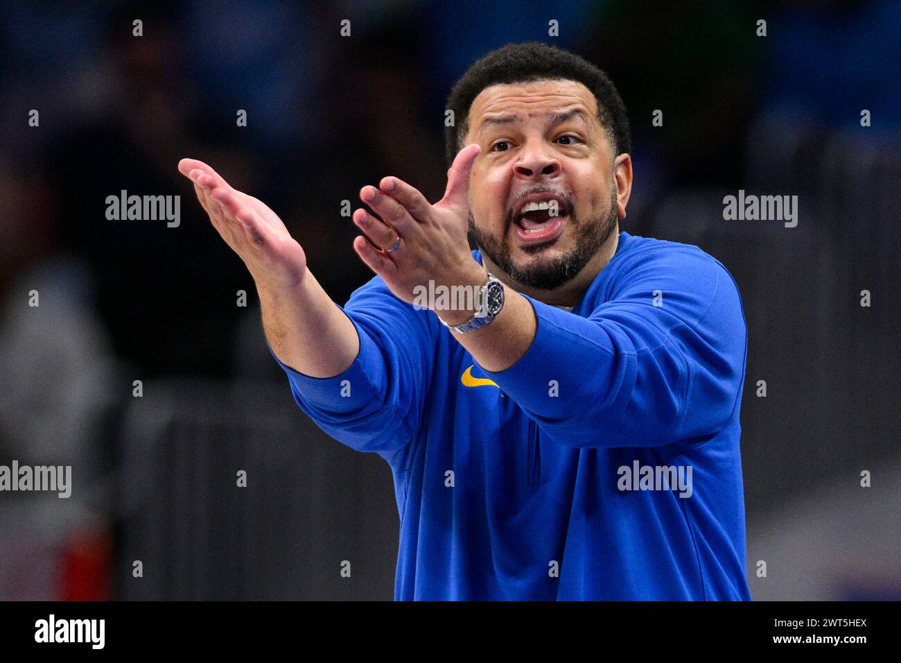Pittsburgh head coach Jeff Capel reacting to action on the court during ...