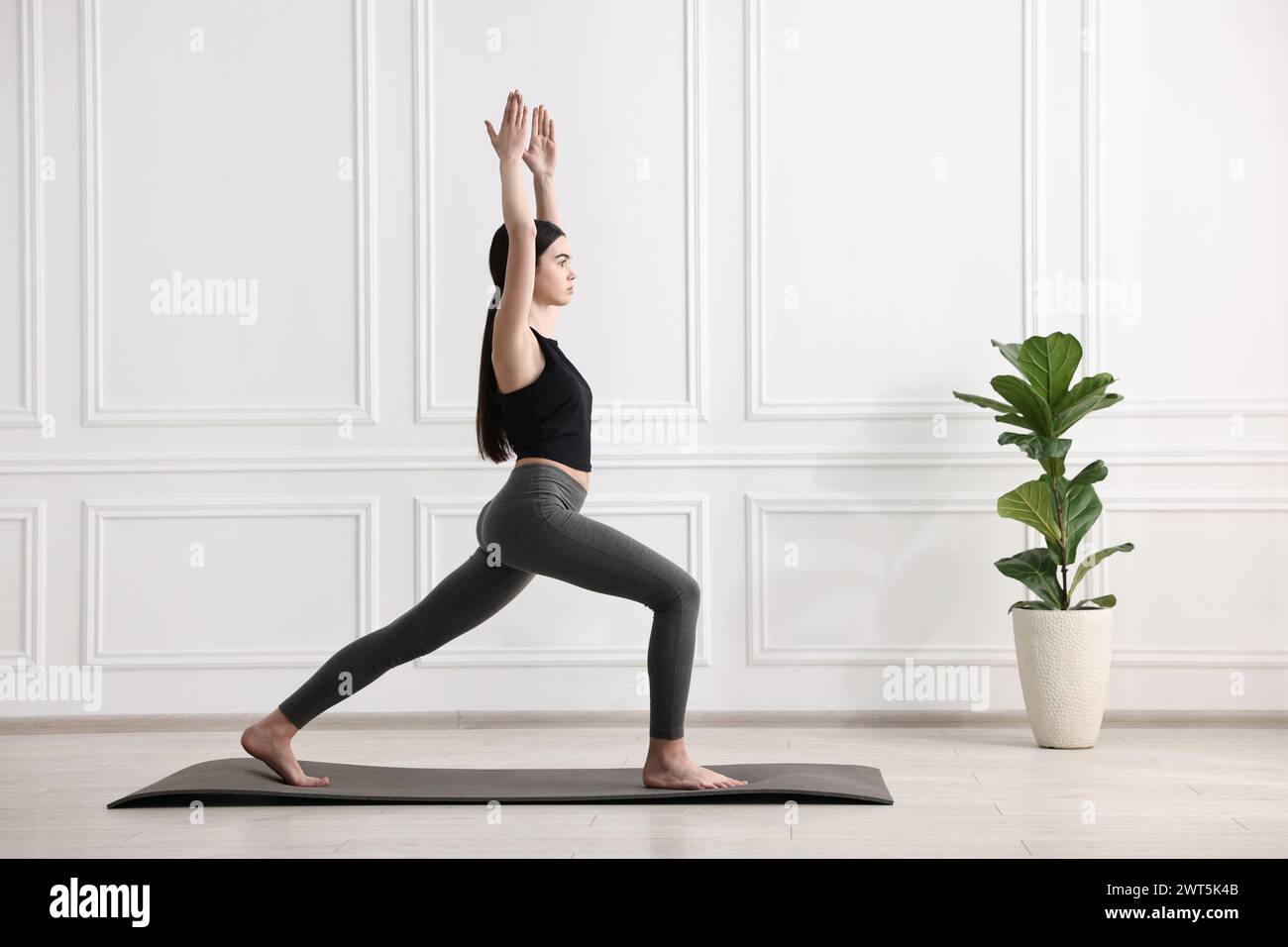 Crescent pose high lunge hi-res stock photography and images - Alamy