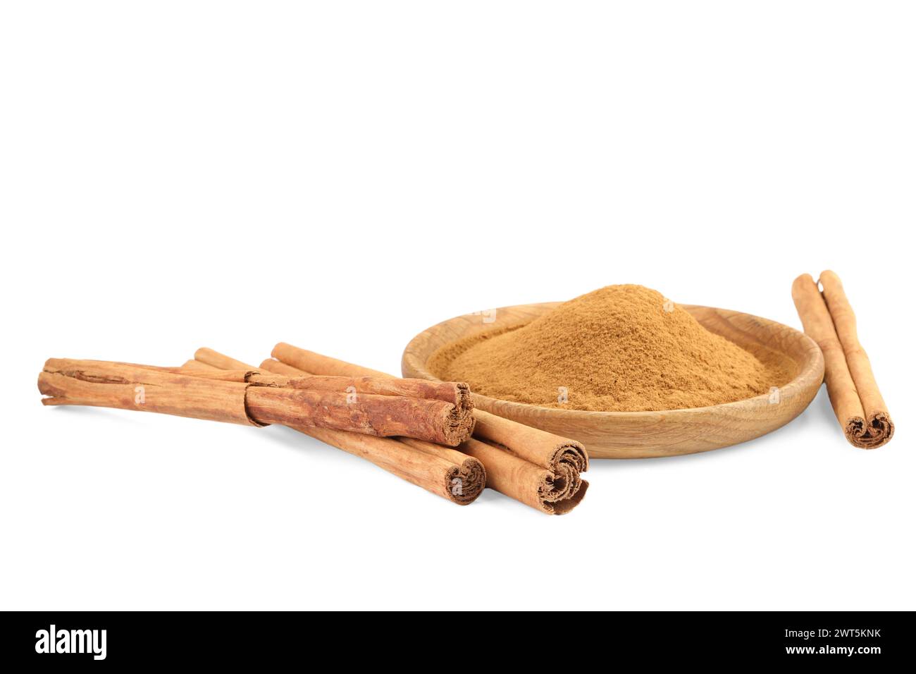 Dry aromatic cinnamon sticks and powder isolated on white Stock Photo ...