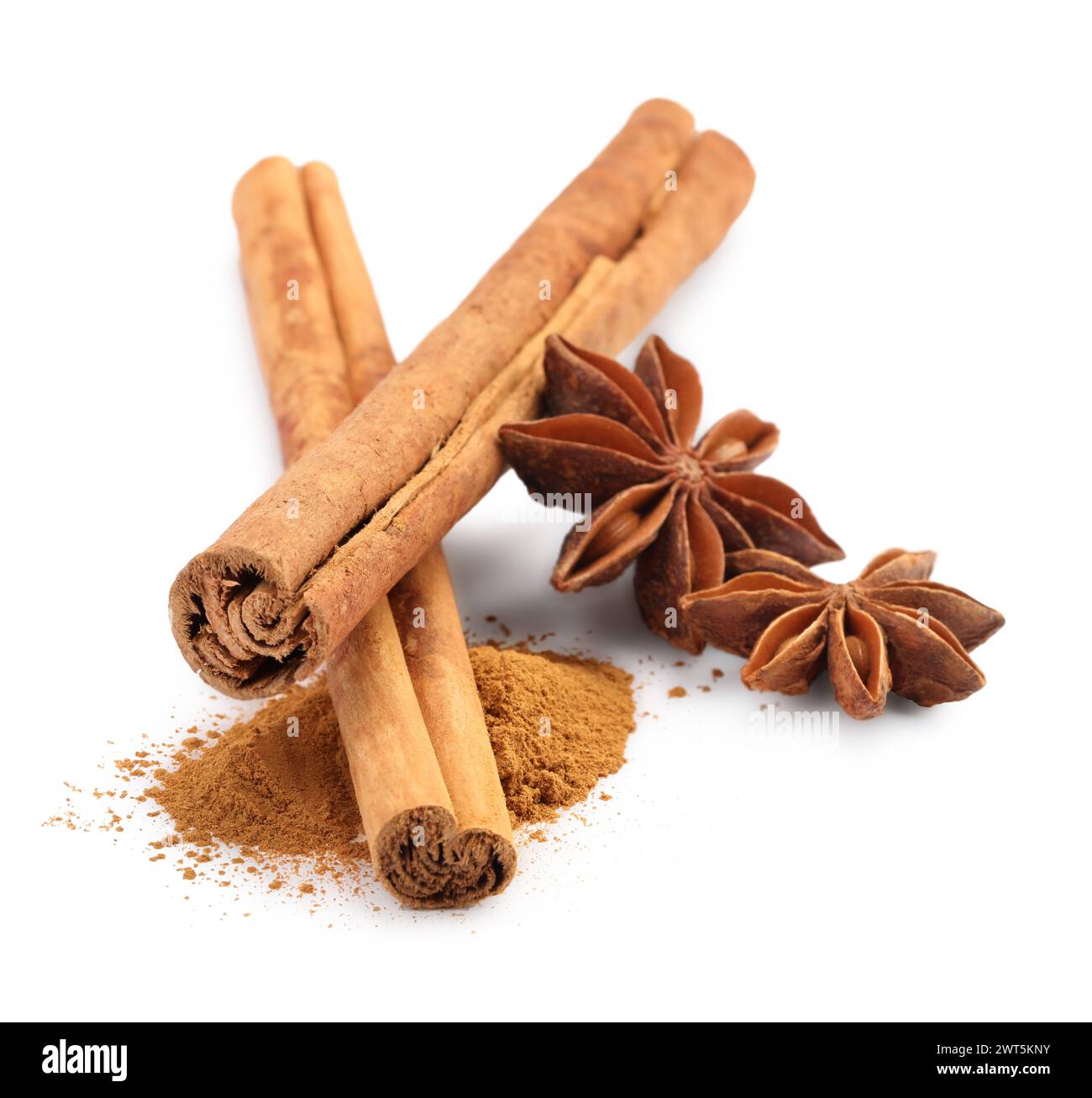 Dry aromatic cinnamon sticks, powder and anise stars isolated on white ...