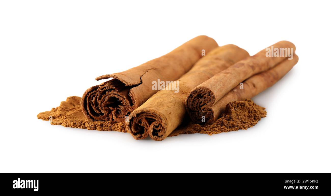 Dry aromatic cinnamon sticks and powder isolated on white Stock Photo ...