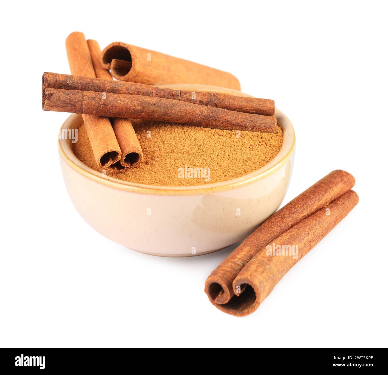 Dry aromatic cinnamon sticks and powder isolated on white Stock Photo ...