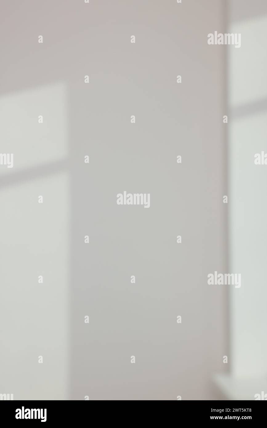 Light and shadows from window on wall indoors Stock Photo - Alamy