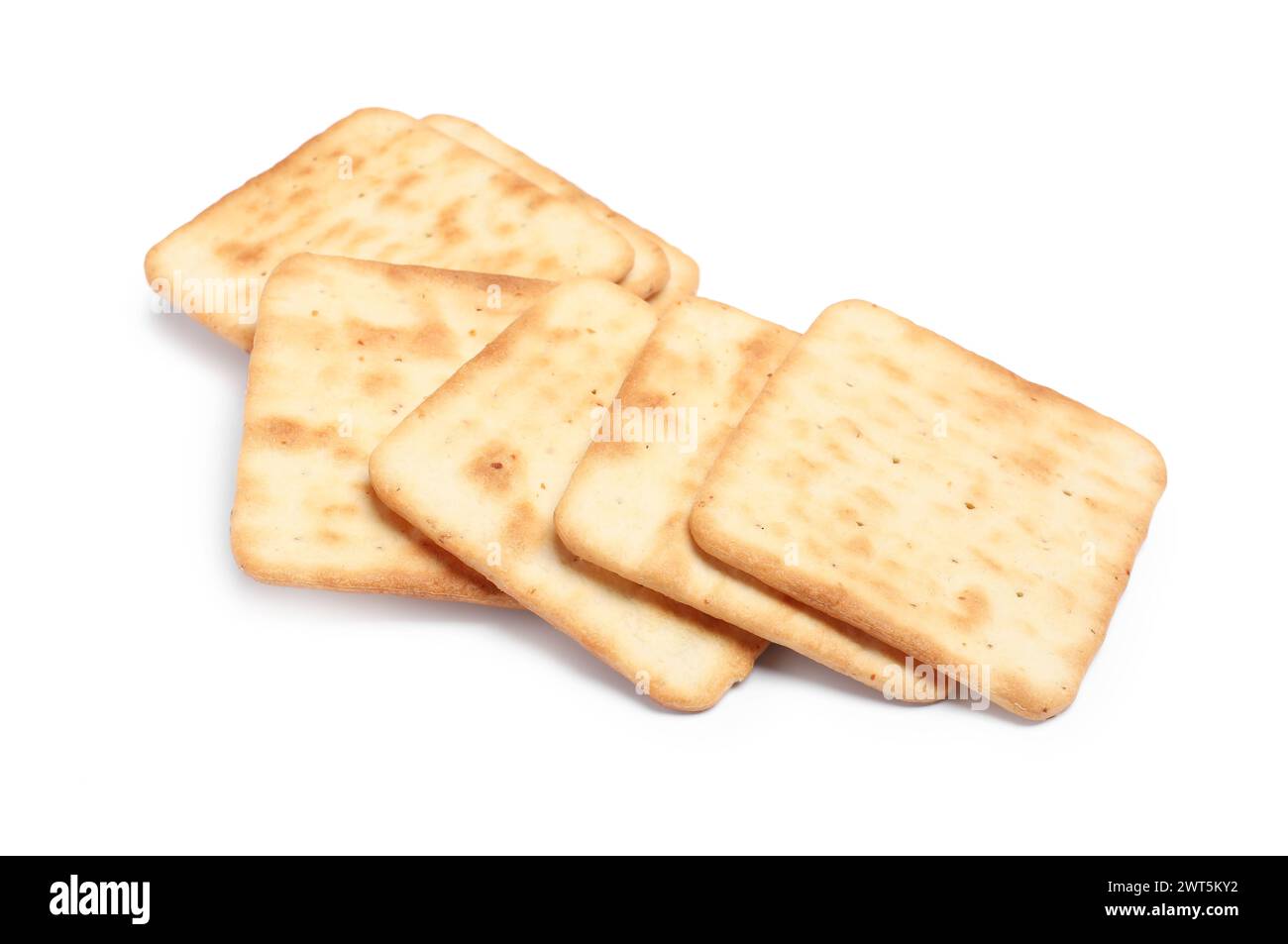 Tasty crispy square crackers isolated on white Stock Photo - Alamy