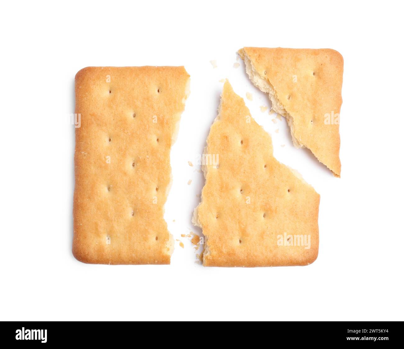 Crispy broken cracker isolated on white, top view Stock Photo - Alamy