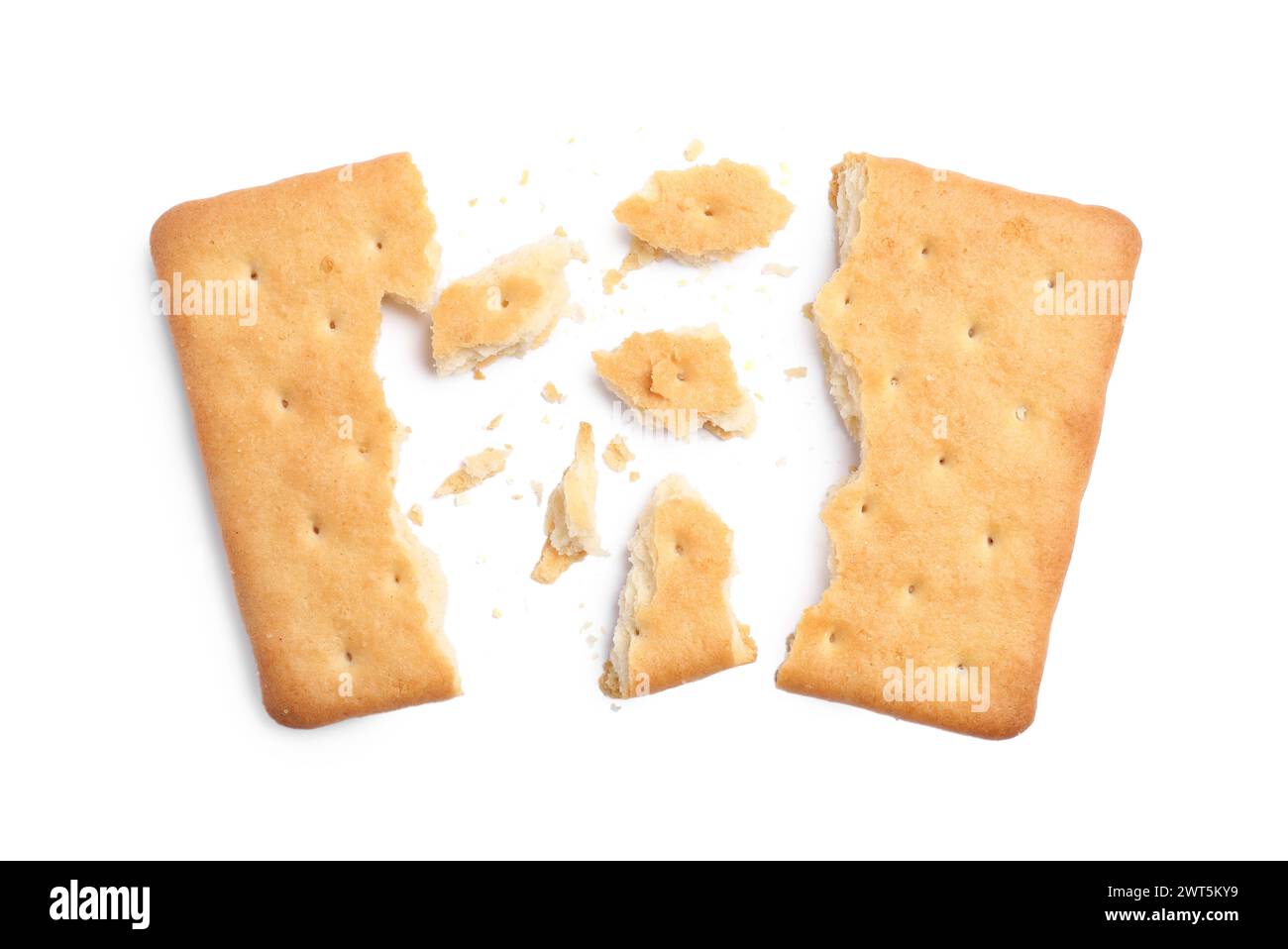 Crispy broken cracker isolated on white, top view Stock Photo - Alamy