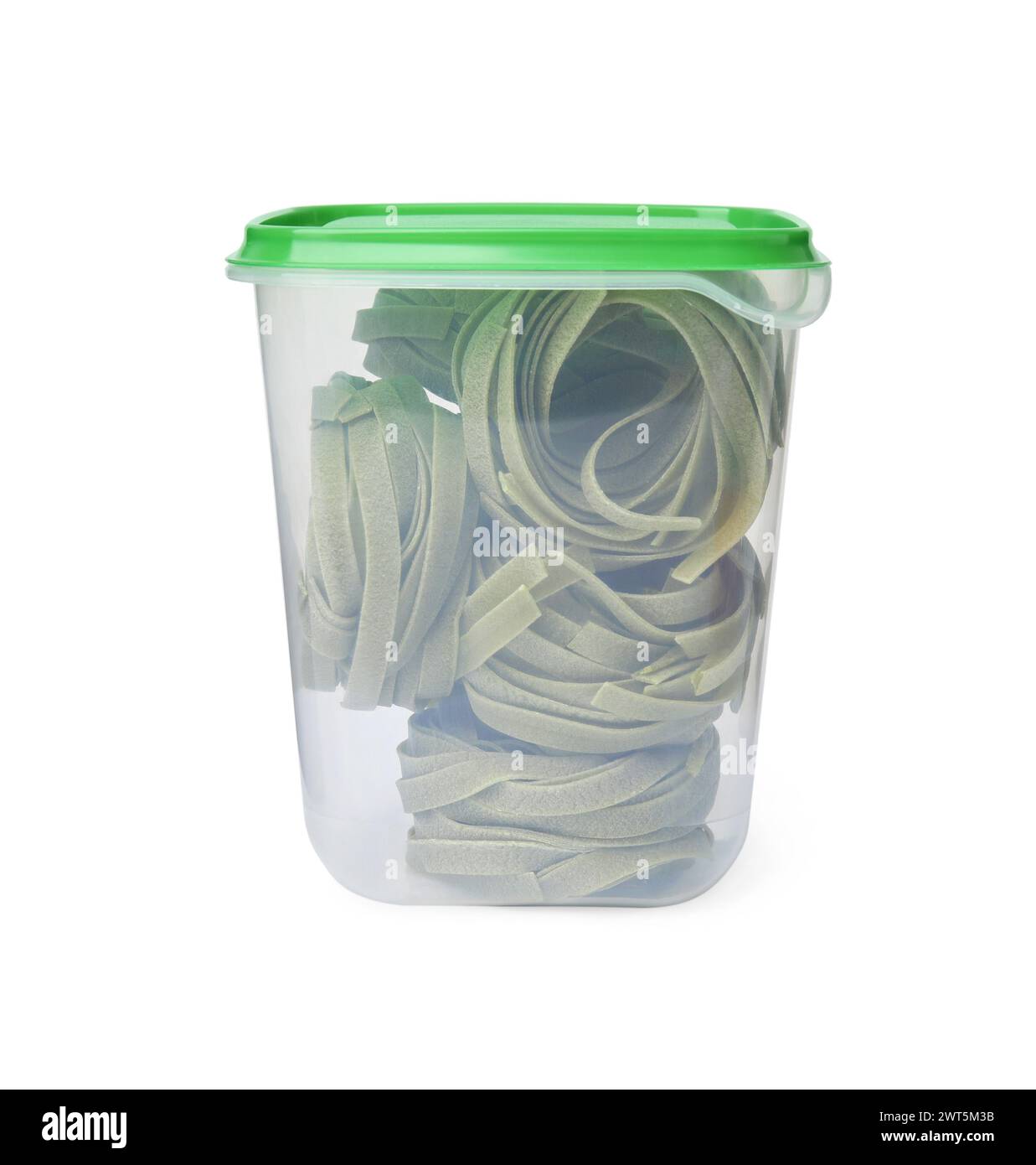 Plastic container filled with pasta isolated on white Stock Photo - Alamy