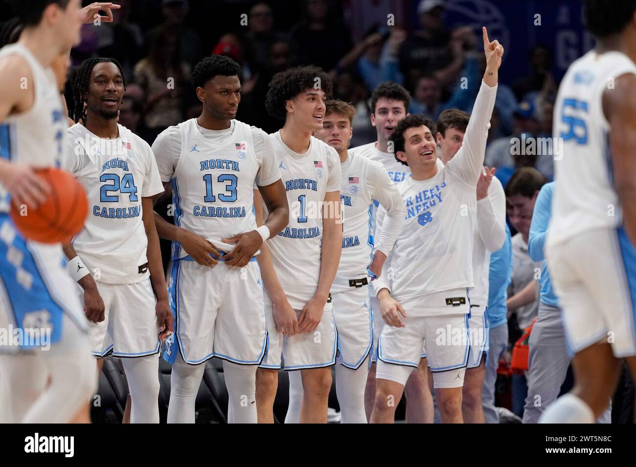 Members of North Carolina team begin to celebrate their win against ...