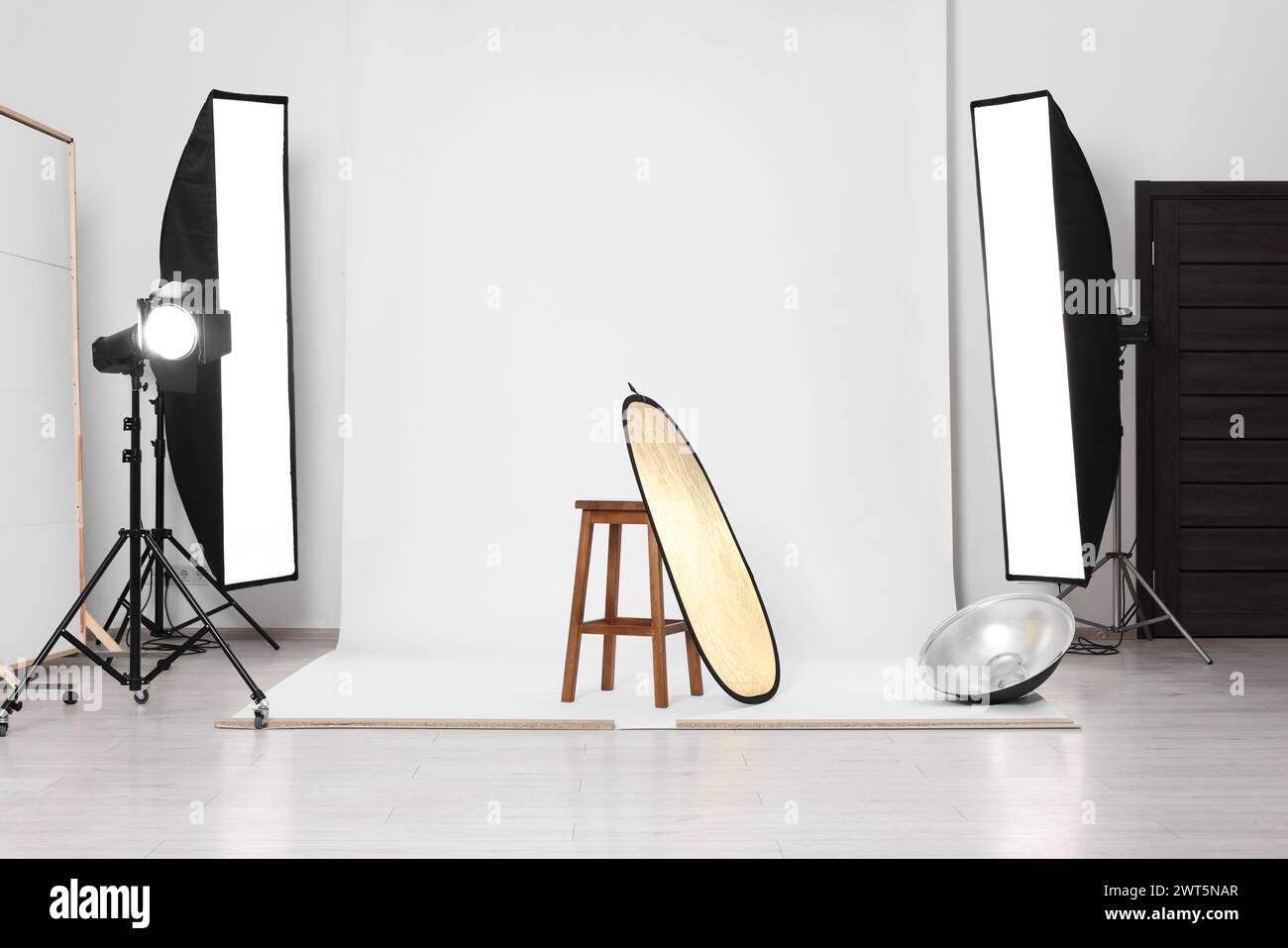 Stool with light reflector, professional lighting equipment and white ...