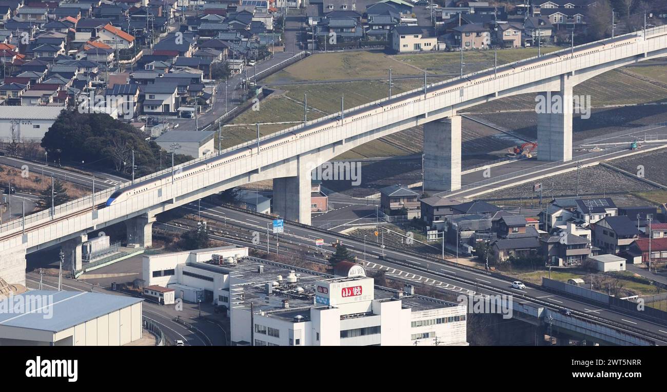 The Hokuriku Shinkansen arrives at Tsuruga Station in Tsuruga City ...