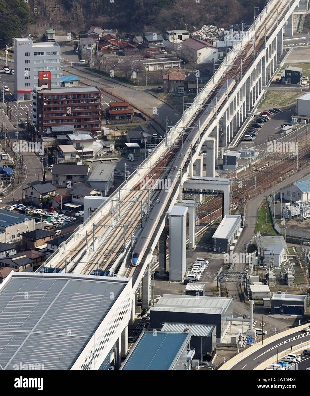 The Hokuriku Shinkansen arrives at Tsuruga Station in Tsuruga City, Fukui Prefecture on March 16 ...