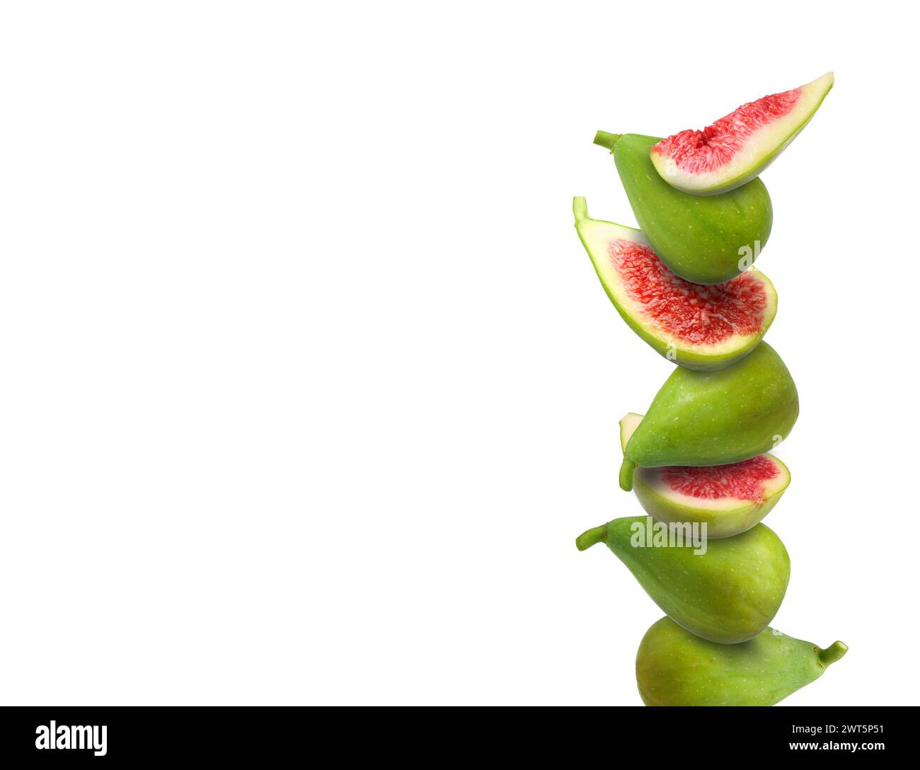 Stacked fresh green figs on white background Stock Photo - Alamy