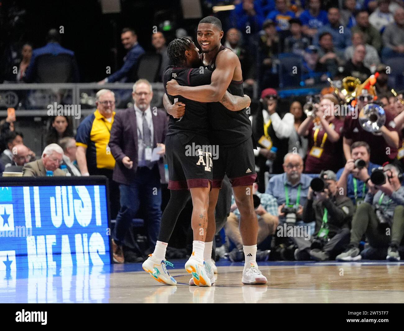 Texas A&M's Wade Taylor IV (4) and Henry Coleman III (15) embrace after ...