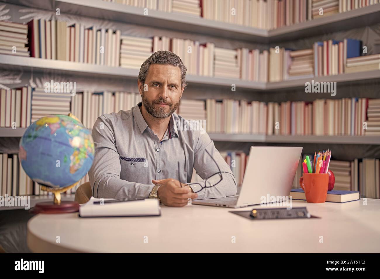 elearning education online with school teacher on laptop in classroom ...