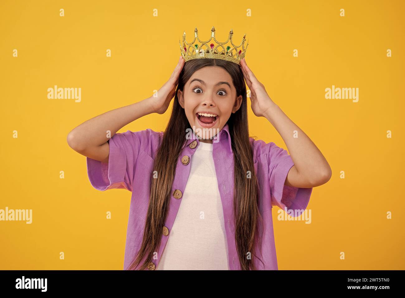 surprised teen girl look girlish in the crown. princess crown fashion ...