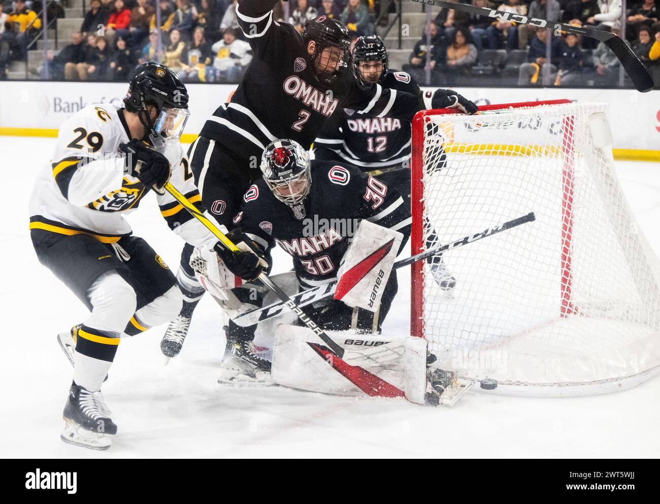 Colorado College forward Drew Montgomery (29) tries to score against ...