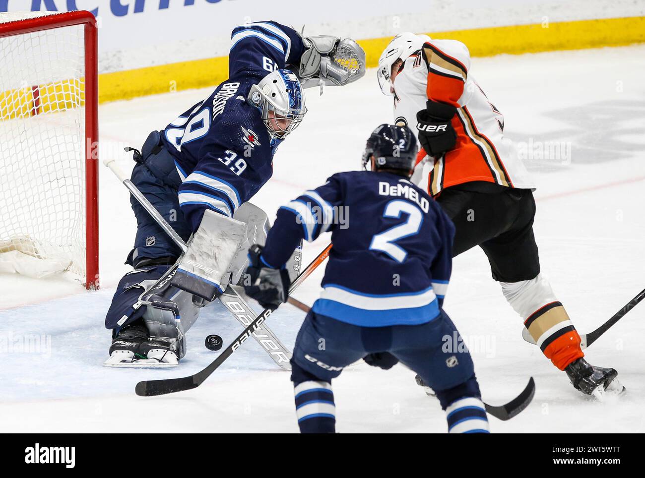 Winnipeg Jets goaltender Laurent Brossoit (39) saves a shot by Anaheim ...