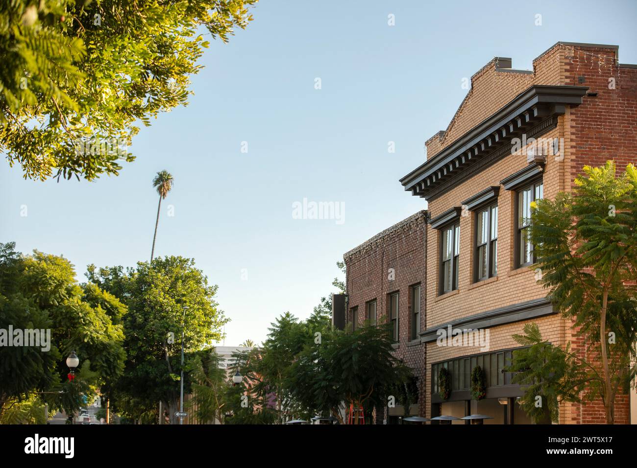 Afternoon light shines on the historic buildings of downtown San Luis ...