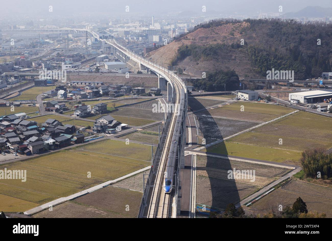 The Hokuriku Shinkansen departs from Tsuruga Station in Tsuruga City ...