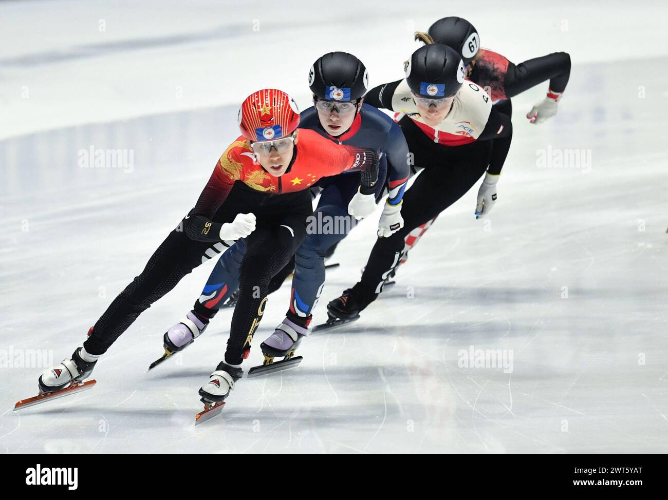 Rotterdam, Netherlands. 15th Mar, 2024. Fan Kexin (L) of China competes ...