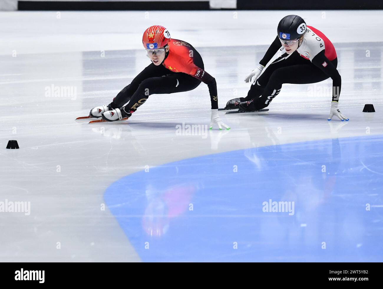 Rotterdam, Netherlands. 15th Mar, 2024. Fan Kexin (L) of China competes ...