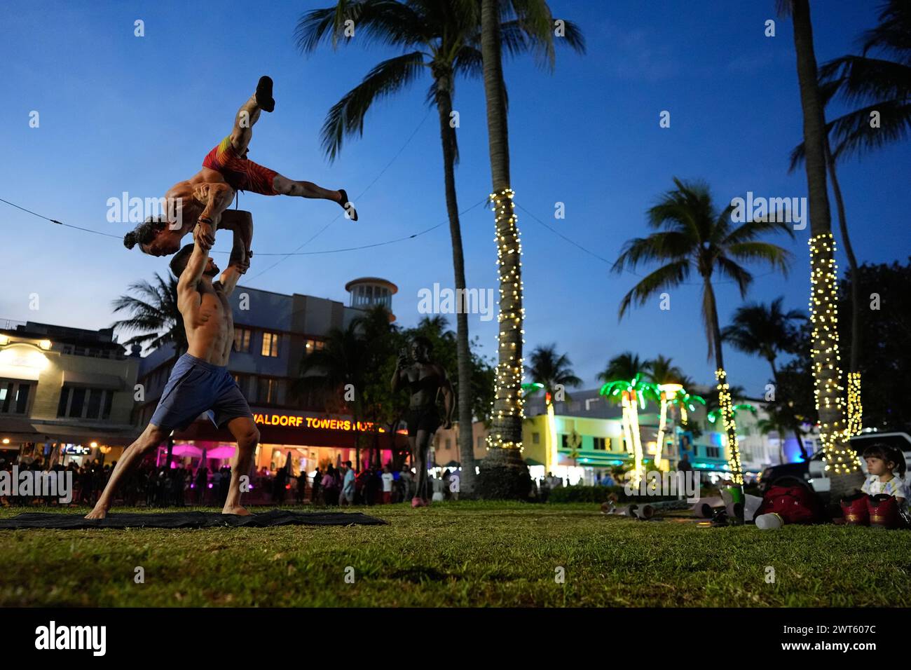Miami Beach resident Sebastian Blanco lifts Hivo Gonzalez as the pair ...