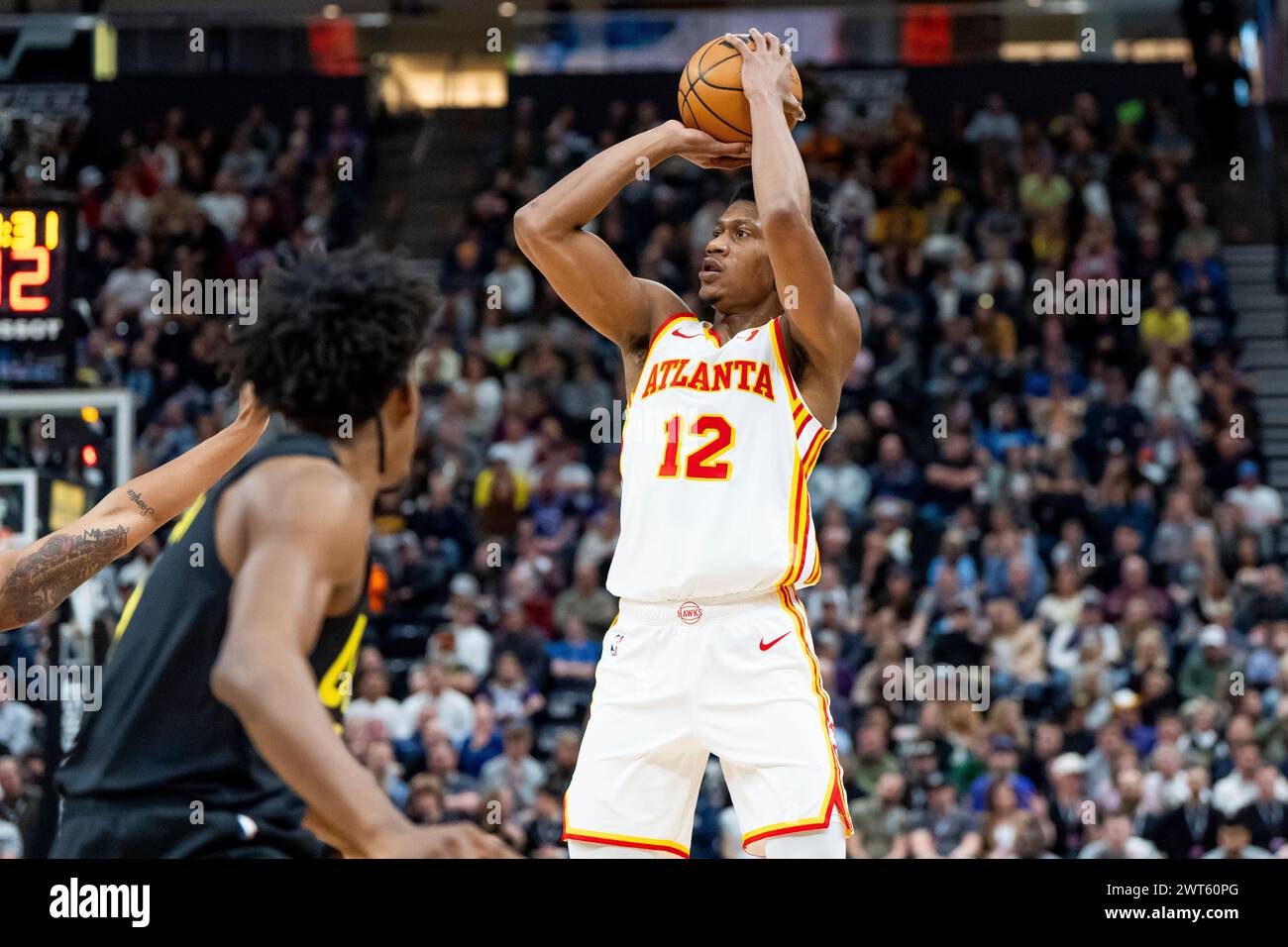 Atlanta Hawks forward De'Andre Hunter (12) shoots during the first half ...