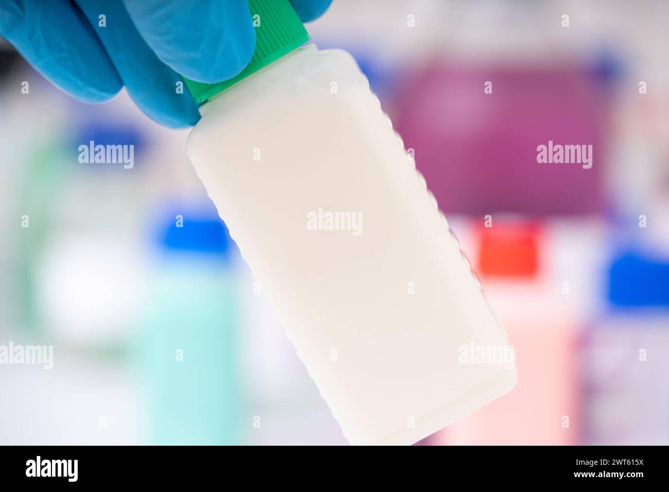 Plastic bottle with white liquid. Sample of a food product in a ...