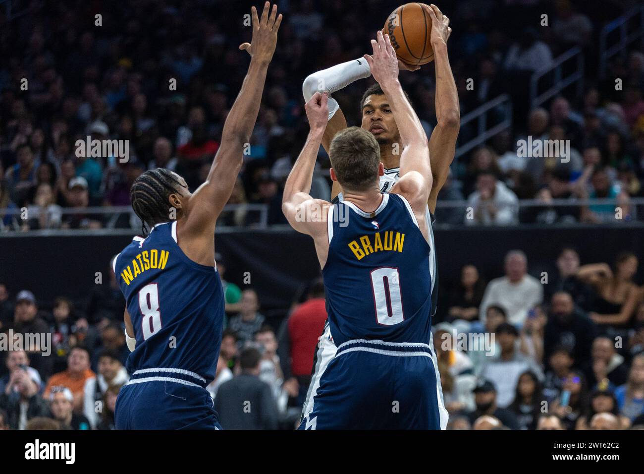 Denver Nuggets forward Peyton Watson (8) and guard Christian Braun (0 ...