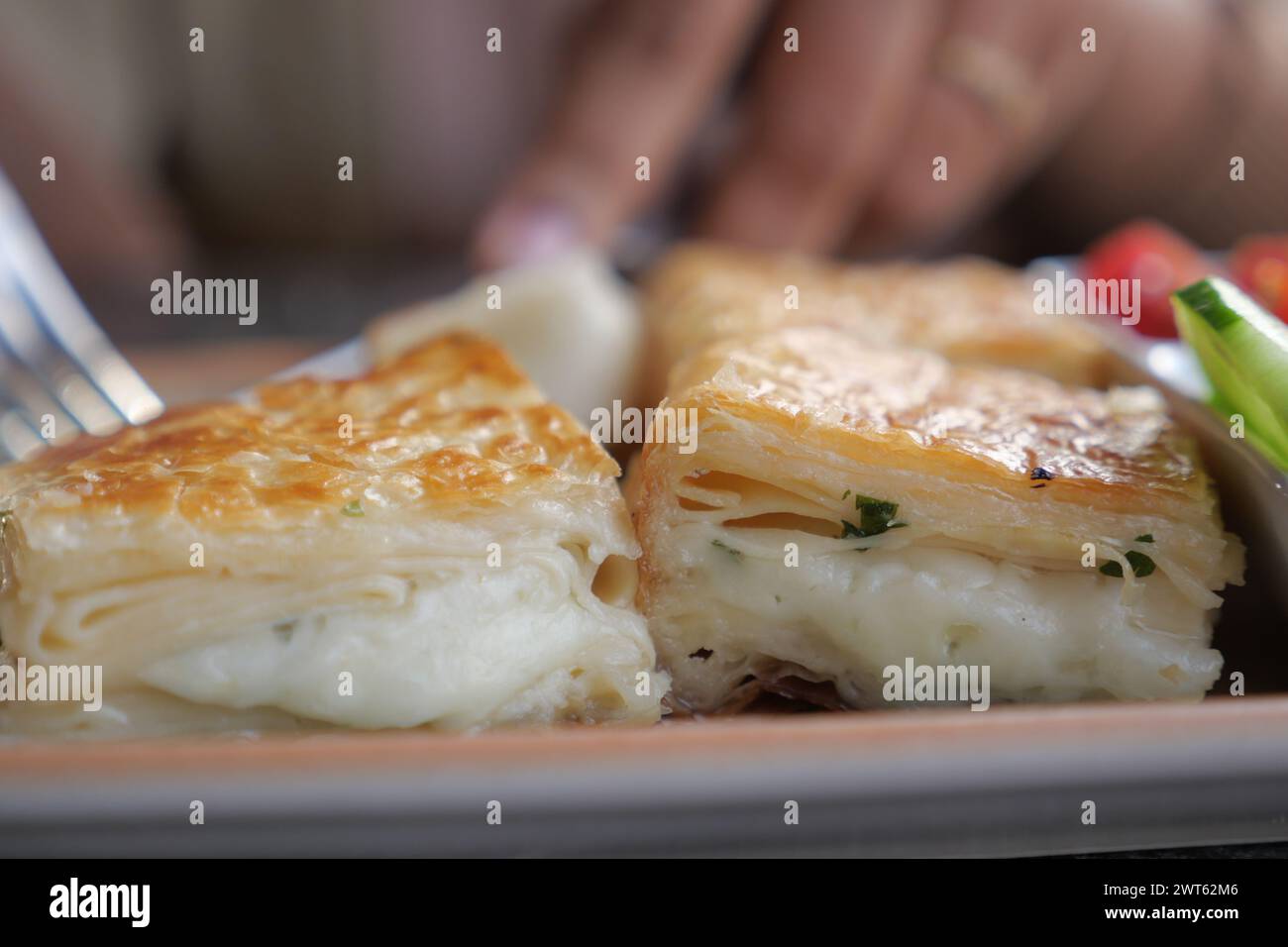 Traditional Turkish Cuisine Pastries borek on a plate Stock Photo - Alamy