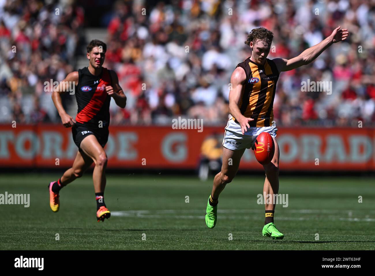 Melbourne, Australia. 16th Mar, 2024. Josh Weddle of the Hawks (right ...