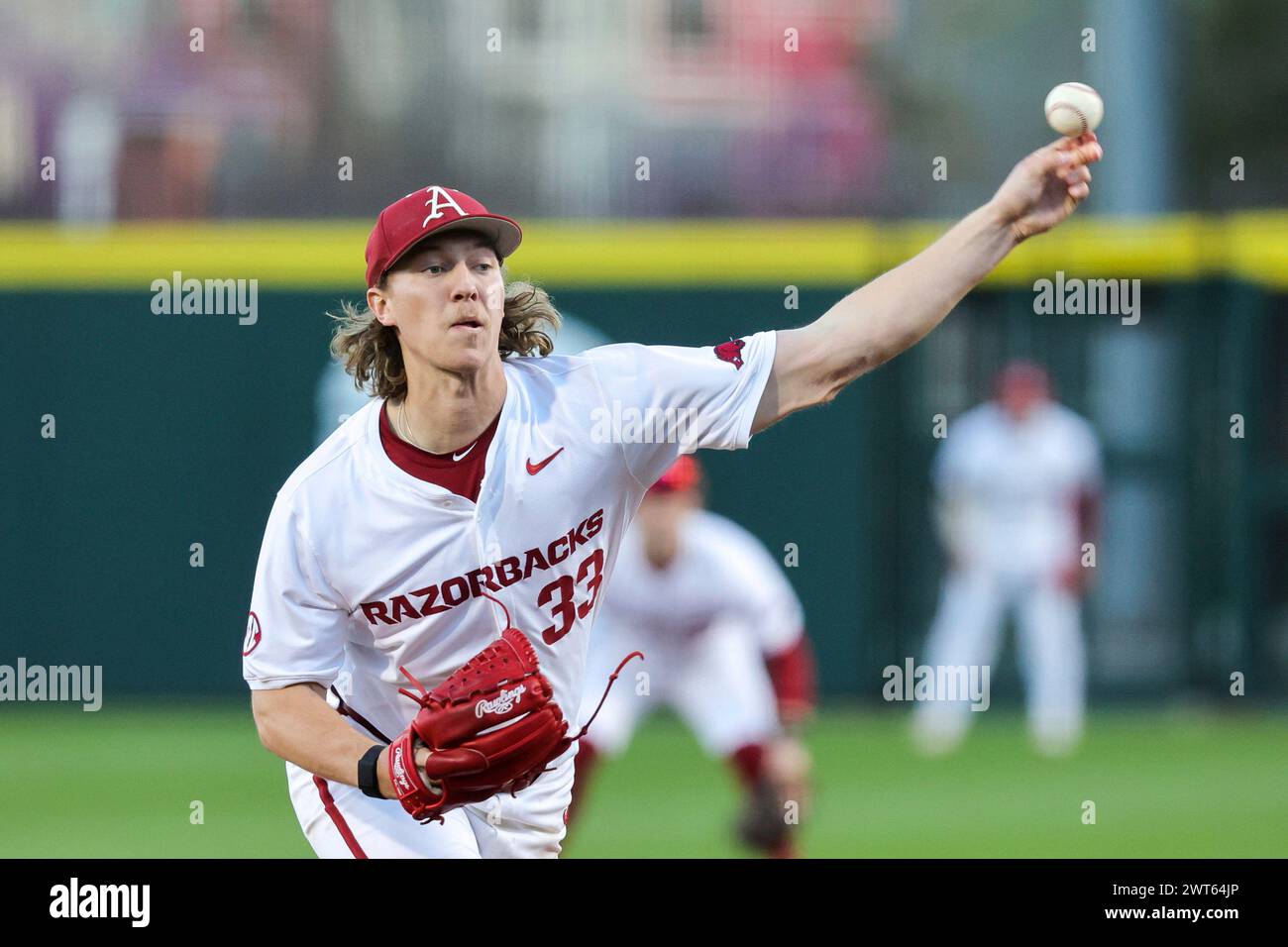 March 15, 2024: The ball comes off the finger tips of Arkansas pitcher Hagen Smith #33. Arkansas ...