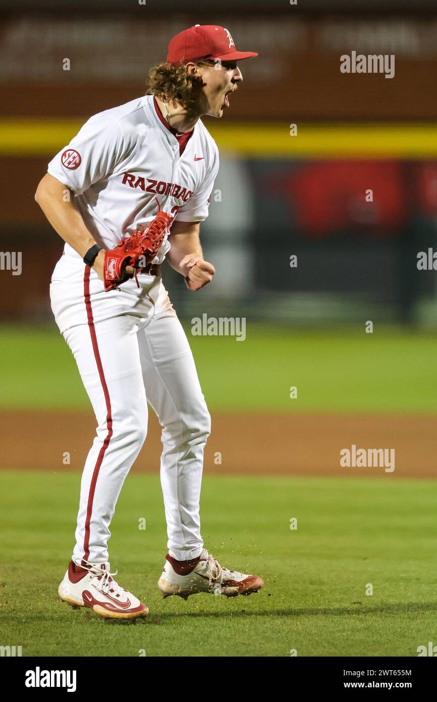 March 15, 2024: Arkansas pitcher Hagen Smith #33 celebrates as he comes ...
