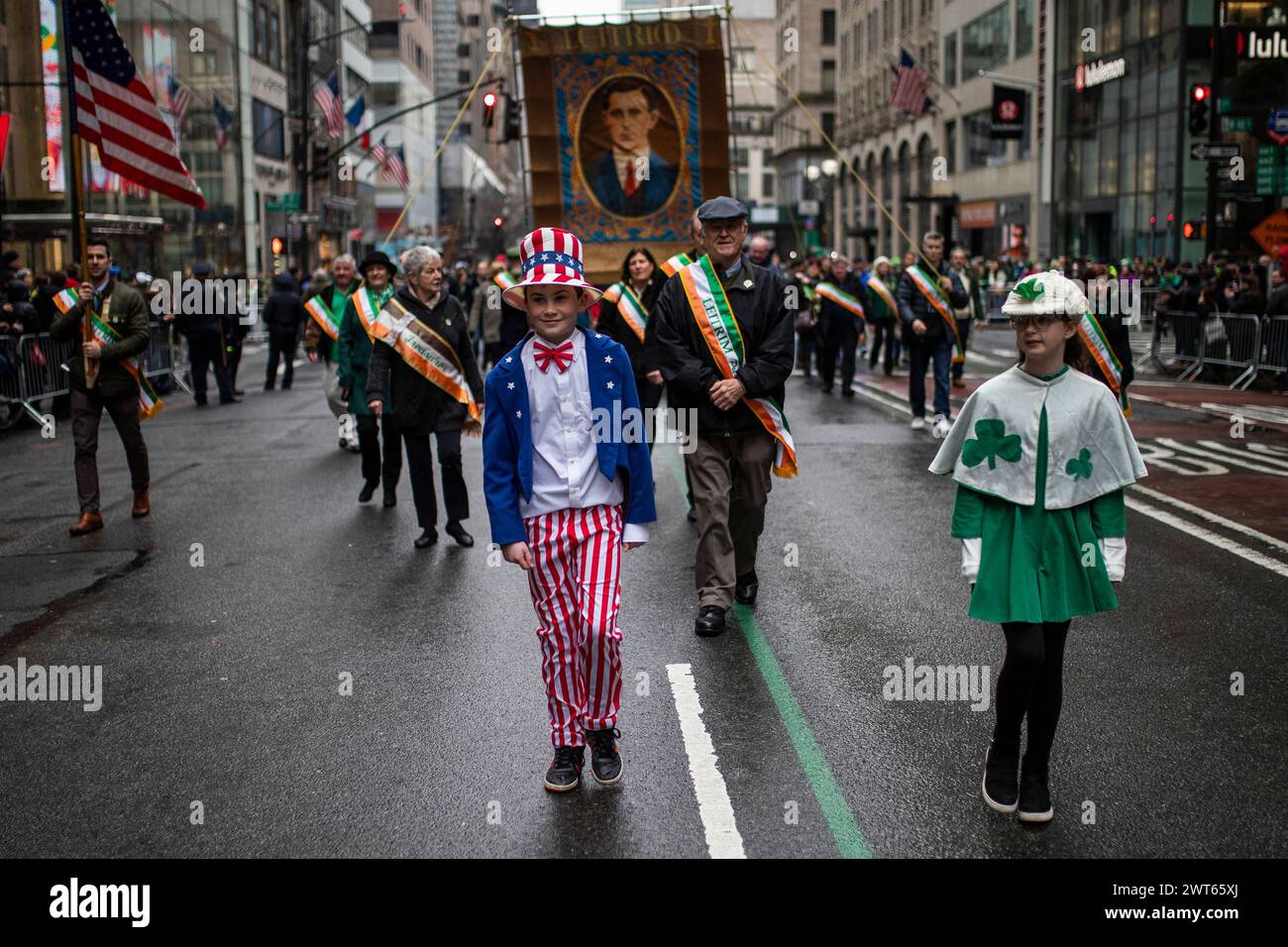 FILE - Participants march up Fifth Avenue during the St. Patrick's Day ...