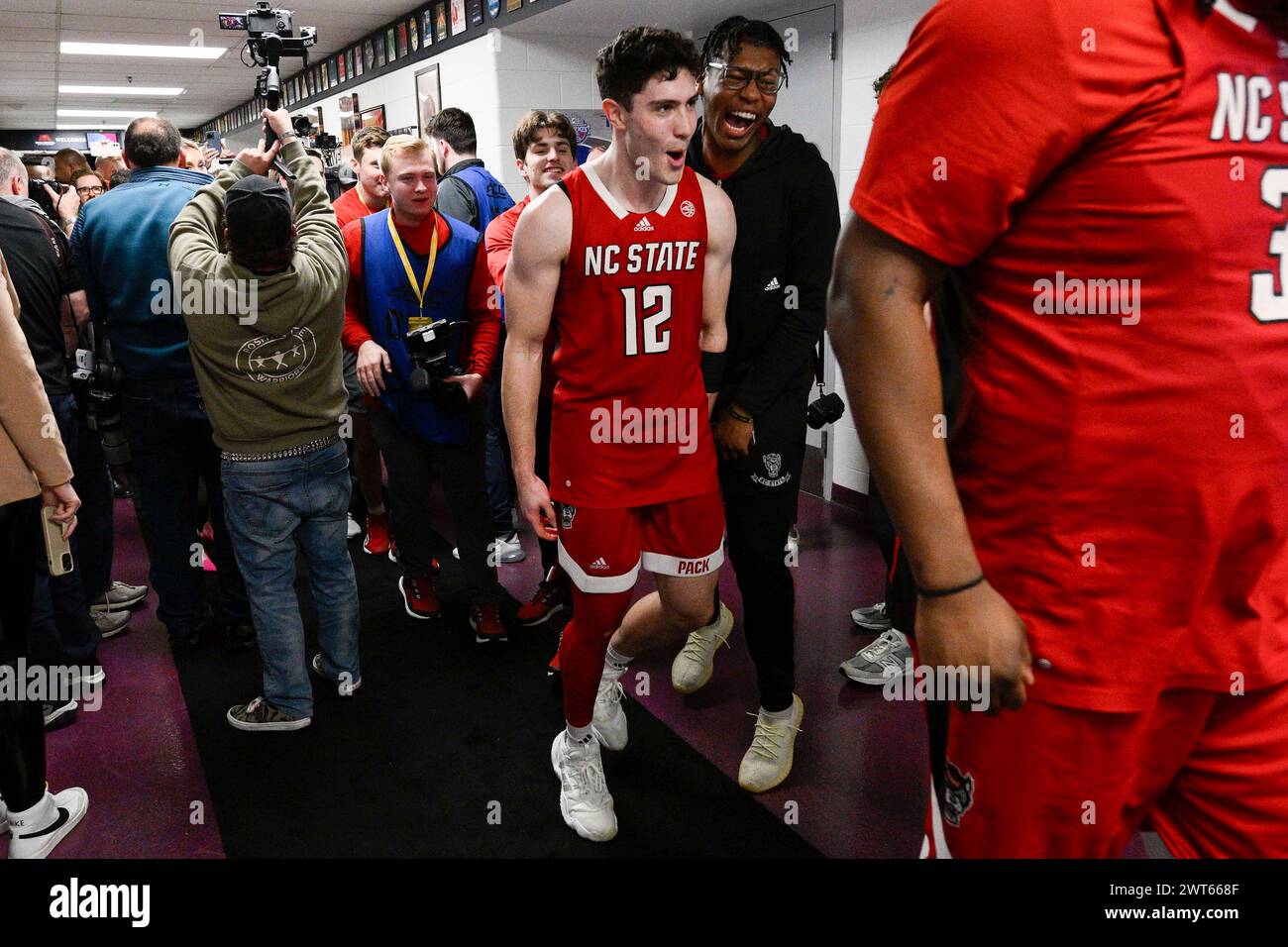 North Carolina State guard Michael O'Connell (12) celebrating with ...