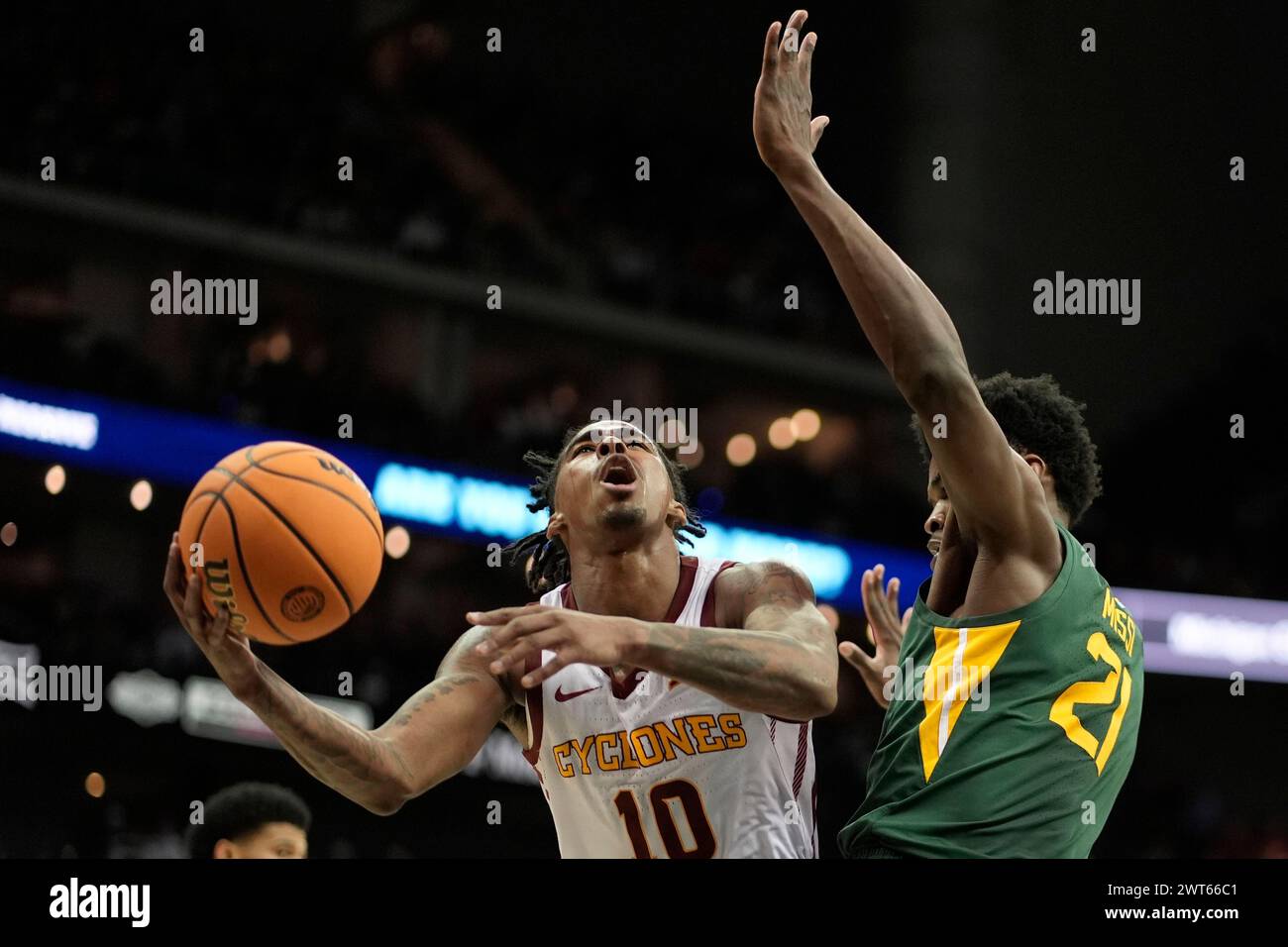 Iowa State guard Keshon Gilbert (10) shoots shoots under pressure from ...